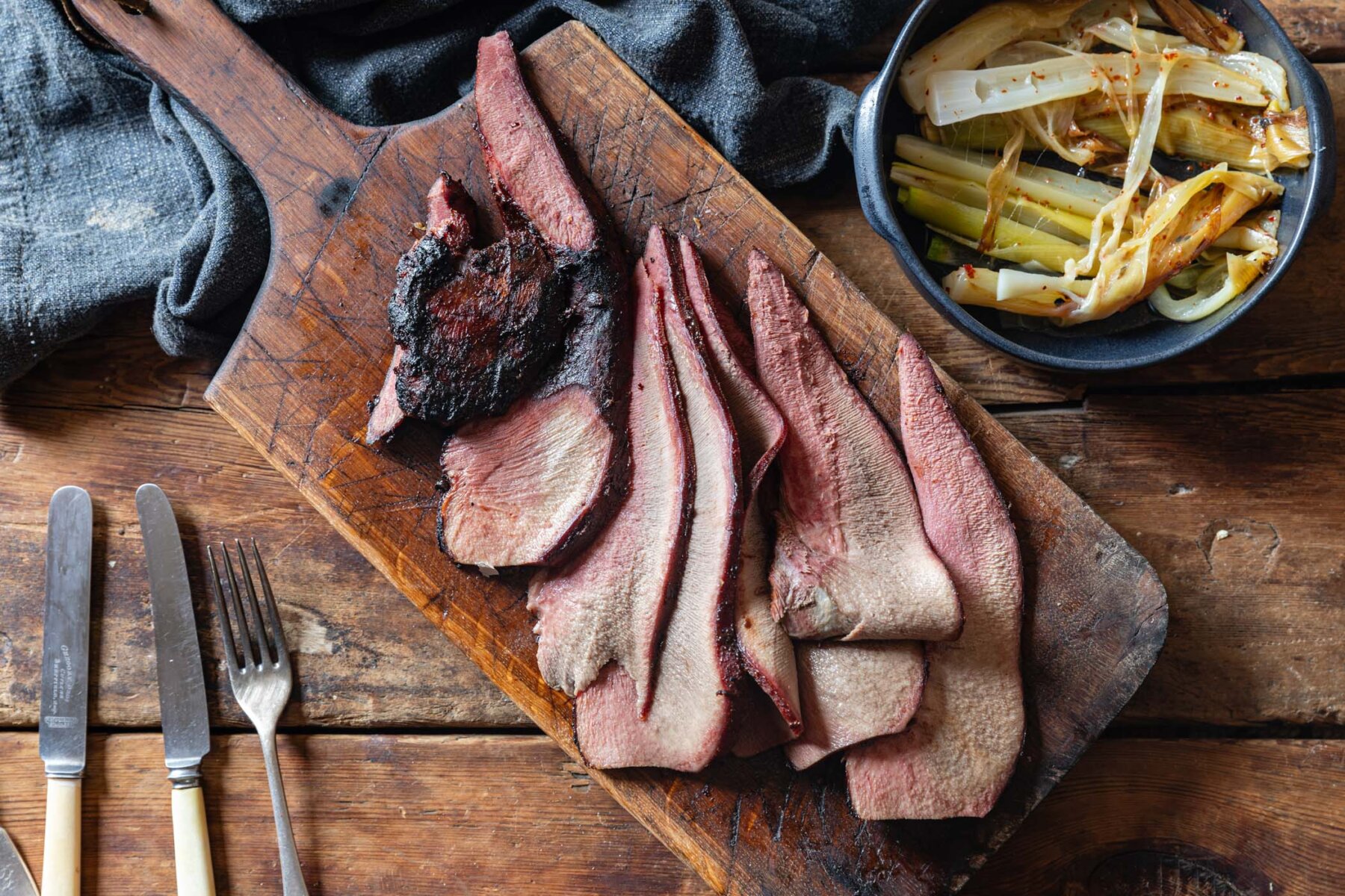 Barbecued Ox Tongue W/ Black Leeks By Valentine Warner